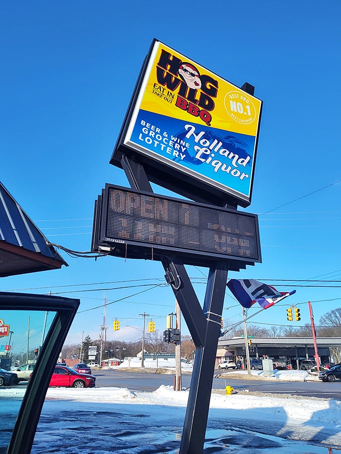 That sign isn't just advertising—it's a beacon of hope for the hungry traveler. In the barbecue universe, this yellow billboard is as welcoming as a front porch light.