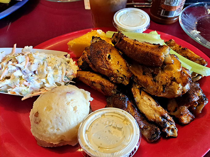 Smoked wings that make you wonder why anyone would ever fry them. That golden cornbread isn't just a side—it's salvation.