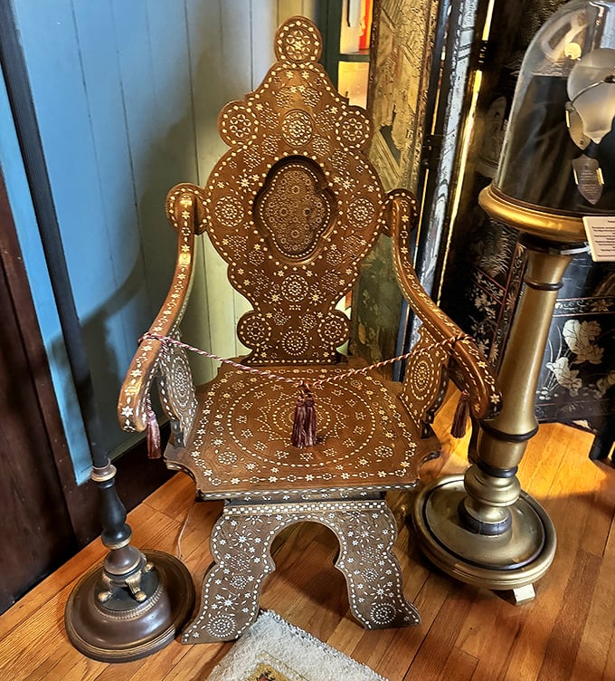 This Spanish colonial Enconchado chair, inlaid with mother-of-pearl, isn't just furniture—it's functional art that makes your ergonomic office chair look positively pedestrian.