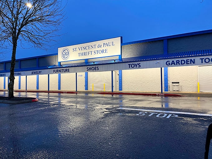The blue-framed building glows like a beacon for bargain hunters navigating Portland's thrift shopping landscape.