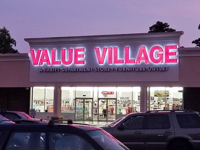 Value Village after dark, its neon sign a beacon for night owls and last-minute shoppers. Treasures don't sleep—they wait.