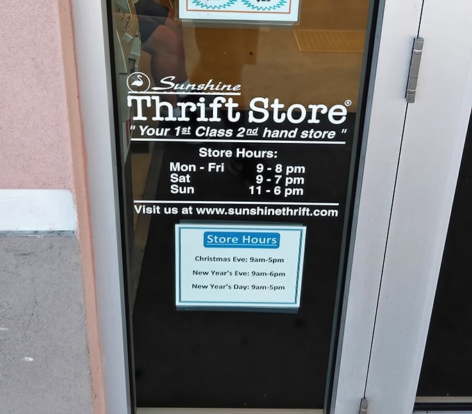 Store hours proudly displayed on the front door. The fine print of thrift store addiction—knowing exactly when you can get your next bargain fix.