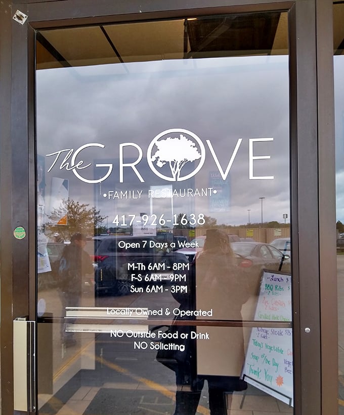 The door promises "Locally Owned & Operated" – six words that tell you everything you need to know about the heart behind this place.