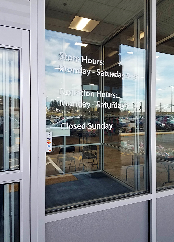 The hours posted clearly—because even treasure hunting requires planning, and Sunday is reserved for counting the weekend's thrifting victories.