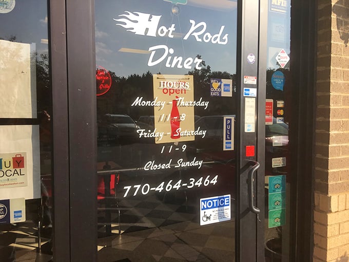 Hours posted on the door—a gentle reminder that even perfection needs a day off, so plan your country fried steak cravings accordingly.