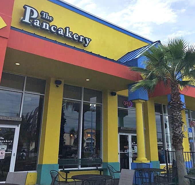 That brilliant yellow exterior isn't just a building—it's a morning lighthouse guiding hungry souls toward pancake salvation.
