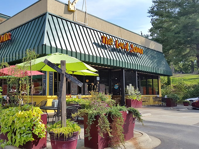 The welcoming exterior with lush planters creates curb appeal that matches the food appeal – a preview of the colorful flavors waiting inside.