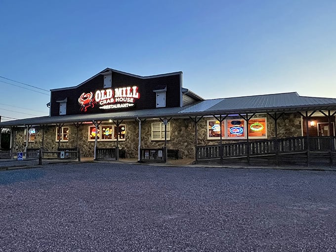As dusk settles, Old Mill's illuminated façade becomes a lighthouse for hungry travelers seeking safe harbor from ordinary dining experiences.