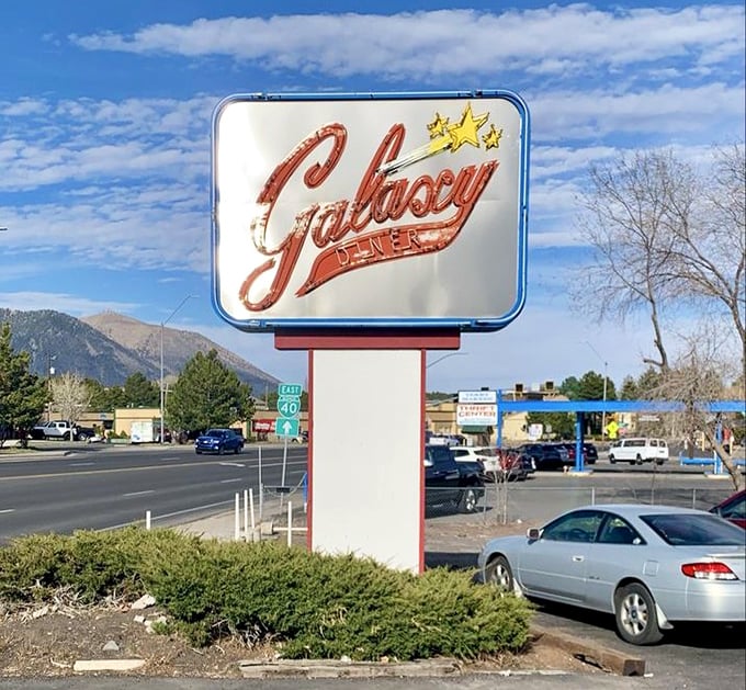 The roadside sign announces your arrival at flavor central, with Flagstaff's mountains providing a backdrop worthy of the food inside.