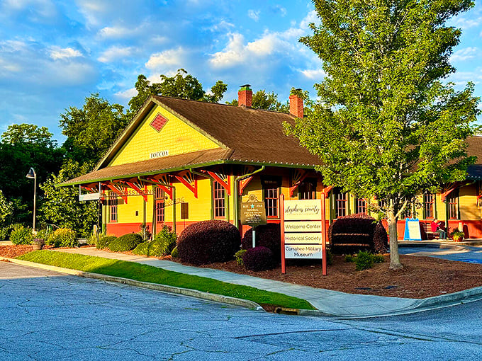 The cheerful yellow Toccoa Amtrak Station welcomes travelers with the promise of small-town hospitality and a reminder of rail's golden age.