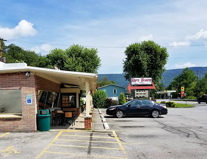 Top's Diner sits against a backdrop of rolling Pennsylvania hills, promising the kind of breakfast that makes you want to cancel your lunch plans.