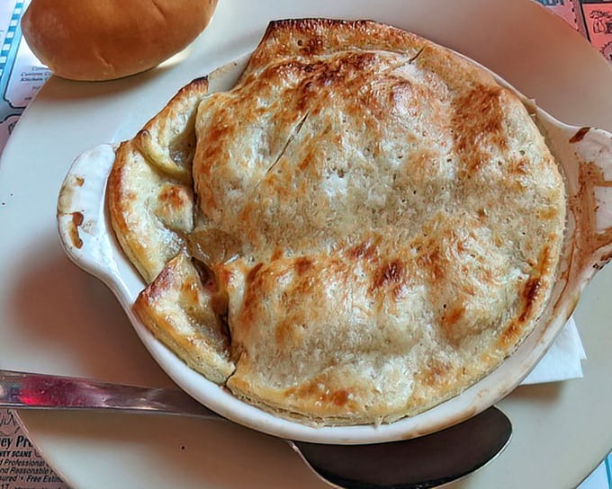A golden-crusted turkey pot pie that whispers, "Don't worry about tomorrow's diet—today we feast like New England royalty."