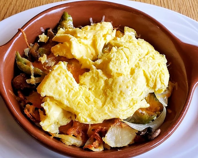 A veggie scramble that makes eating your greens feel like cheating on your diet—with cheese playing matchmaker between eggs and vegetables.