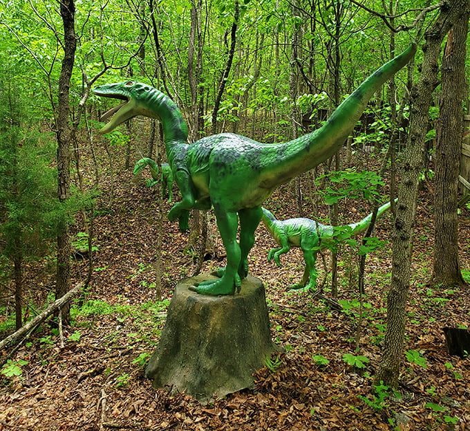 This vibrant green velociraptor stands ready to pounce from its tree stump – the stuff of both nightmares and fantastic vacation photos.