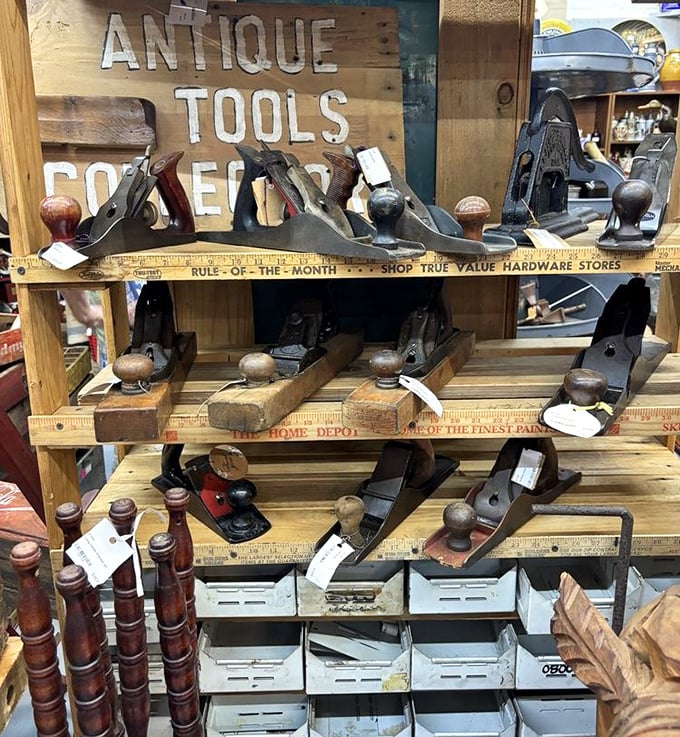 Vintage hand planes and woodworking tools arranged with the reverence they deserve – each one a testament to craftsmanship before the age of power tools.