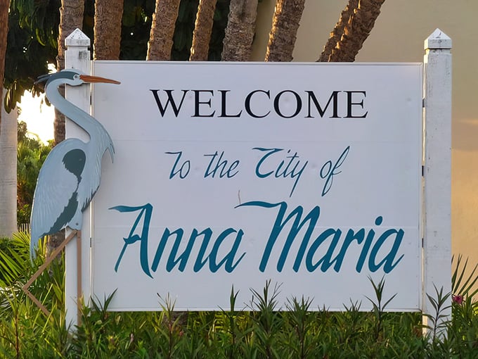 The welcome sign features a heron because regular letters alone couldn't possibly convey the natural beauty waiting just beyond.