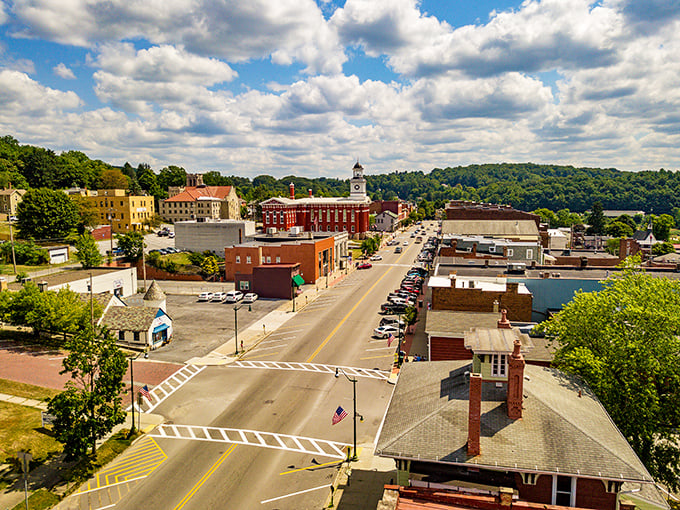 From above, Brookville reveals its perfect small-town layout—historic courthouse at center, surrounded by brick buildings and embraced by verdant hills.