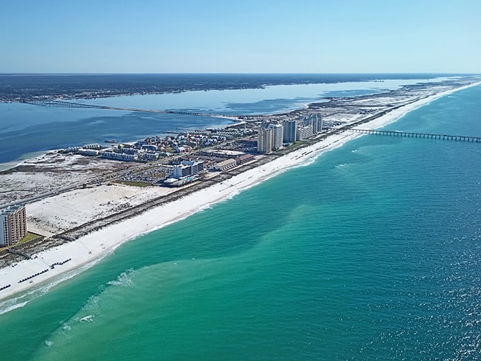 The peninsula perspective: From above, Navarre reveals its perfect positioning—Gulf on one side, Sound on the other, and happiness everywhere in between.