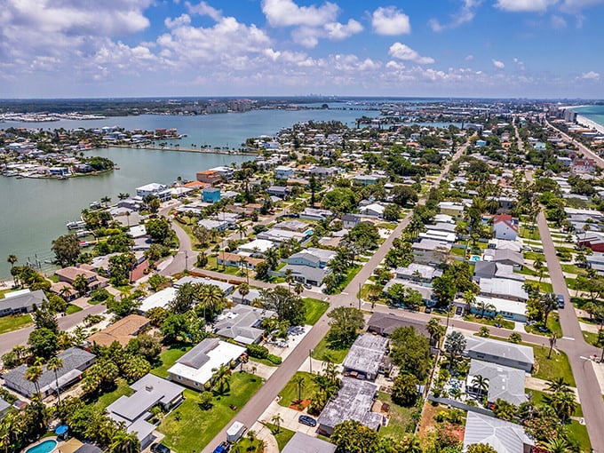 From above, Redington Beach reveals its perfect positioning—nestled between bay and ocean, a community designed by geography for maximum water access.