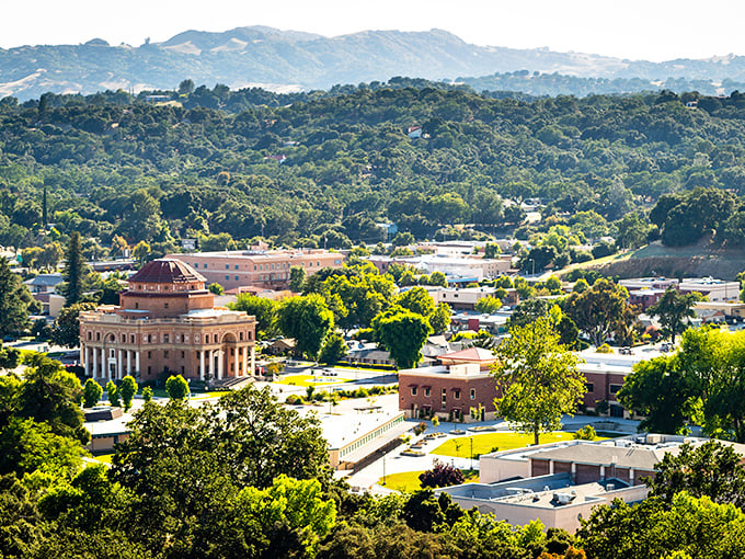 From above, Atascadero reveals its perfect positioning – nestled in oak-studded hills with the iconic City Hall dome anchoring a community that's mastered affordable California living.