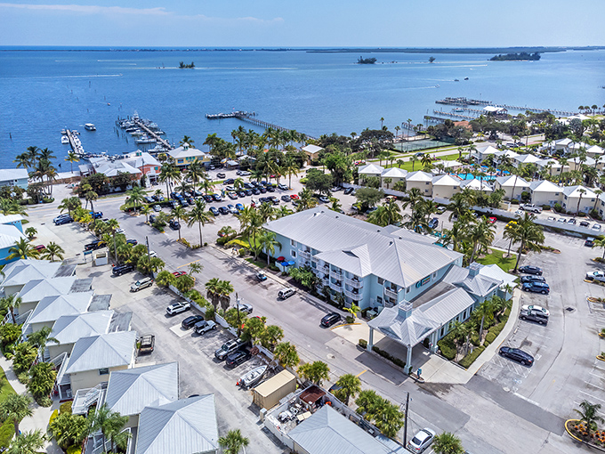 Sebastian reveals its true character from above – a perfect patchwork of blue waters, white boats, and green palms creating Florida's most relaxing geometric pattern.
