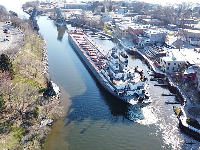 Winter reveals Manistee's working waterfront, where Great Lakes freighters navigate the channel in a dance that's continued for over a century.