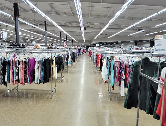 The clothing aisle stretches like a runway of possibility, where your next favorite outfit costs less than your morning coffee run.