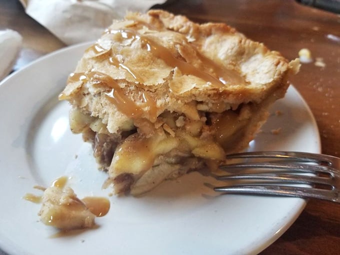 This slice of apple pie isn't just dessert—it's the final chapter in a comfort food story that leaves you already planning your return visit.