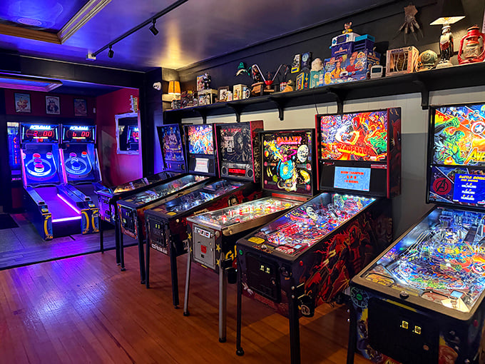 The arcade room glows with nostalgia and possibility—pinball wizards and button-mashers find common ground in this neon-lit playground.