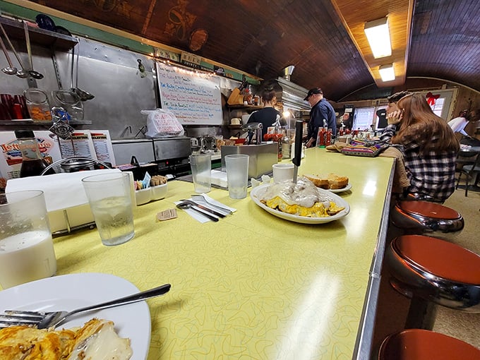 The yellow countertop—a front-row seat to the breakfast show. Half the experience is watching your meal come to life before your very eyes.