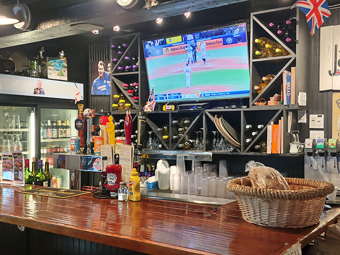 The bar isn't just serving drinks—it's dispensing liquid authenticity with British beers on tap and football (not the American kind) on the telly.