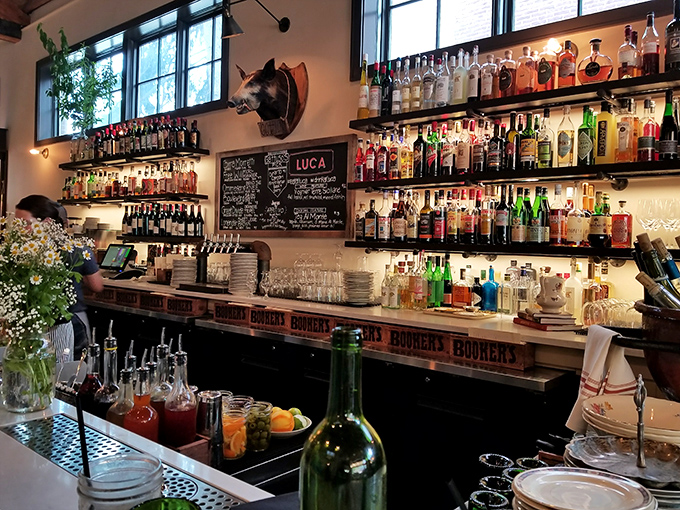 A bar stocked for serious cocktail exploration—like an adult candy store where the treats come in liquid form and the possibilities seem endless.