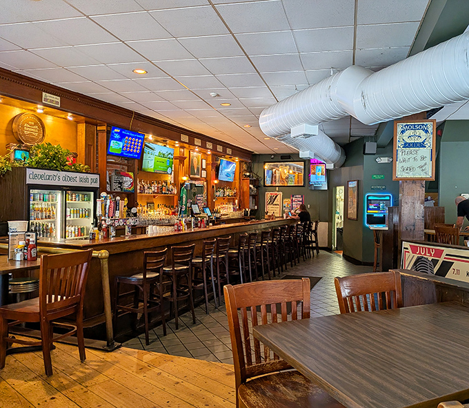 The bar area—where strangers become friends, sports allegiances are tested, and the bartenders remember your name and your usual order.