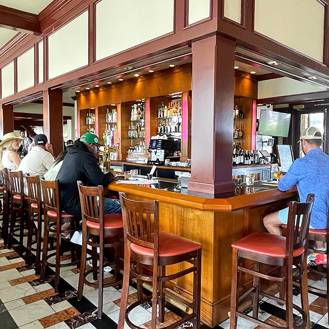 The bar where strangers become friends over stories of "the best seafood I've ever had"—a claim that's surprisingly difficult to dispute.
