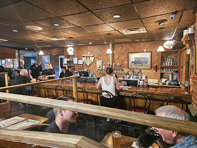 The bar area—where strangers become friends and friends become family over German drafts and sausage platters. Prost to that!
