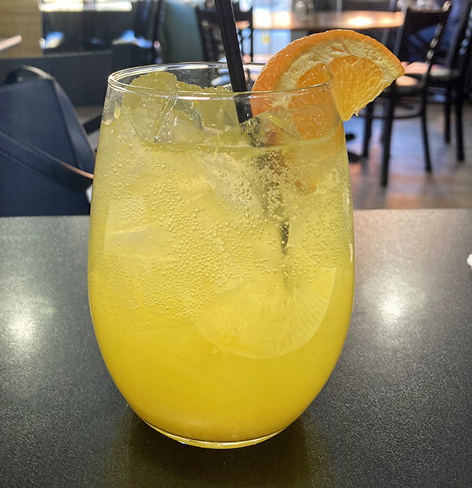 This isn't just a mimosa—it's liquid sunshine in a glass. The perfect companion to whatever breakfast masterpiece you've ordered.