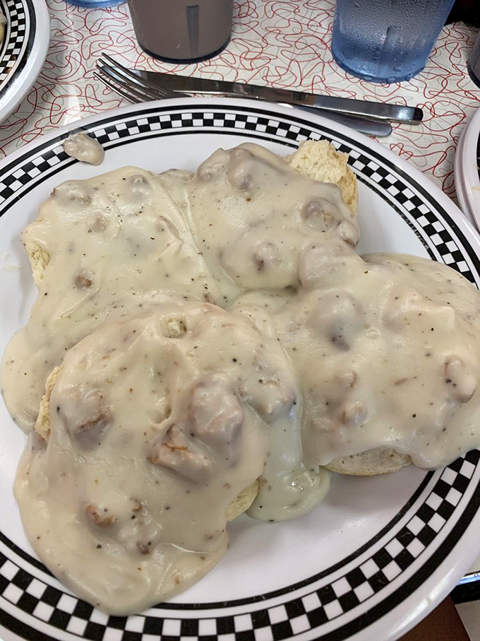 Biscuits and gravy isn't just breakfast—it's edible therapy. This plate doesn't just feed your body; it soothes your soul with creamy, peppery comfort.