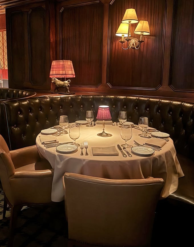 These leather booths aren't just seating—they're an invitation to settle in for a proper meal where time slows deliciously.
