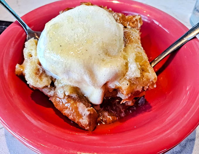 Bread pudding topped with vanilla ice cream, because sometimes dessert is the perfect punctuation mark.