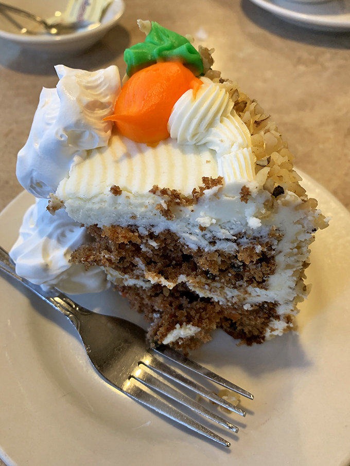 Carrot cake that doesn't skimp on the frosting—because life's too short for dry cake or thin icing layers.