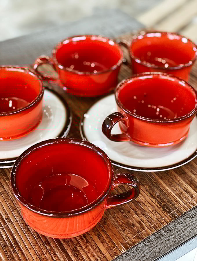 Vibrant coral cups that make morning coffee feel like a celebration. Everyday ceramics with extraordinary personality for your kitchen collection.