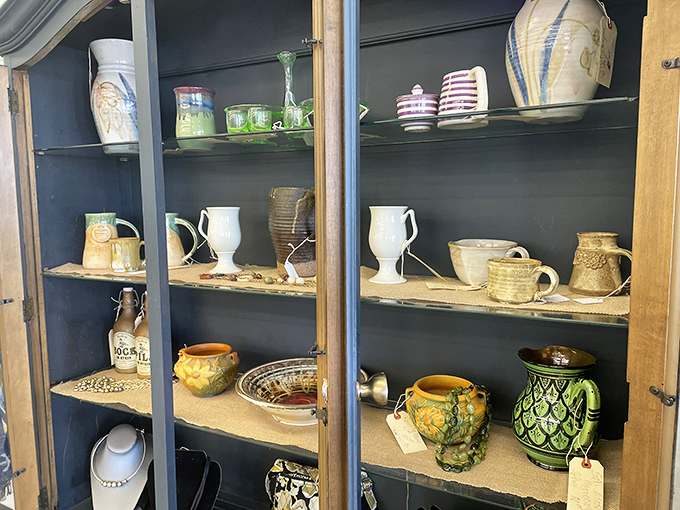 Behind glass doors, pottery from different eras sits patiently waiting for its next dinner party spotlight moment. Vintage serving with modern flair.