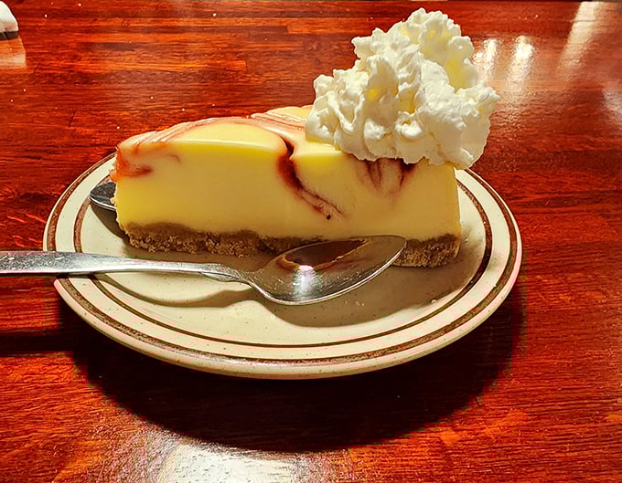 This cheesecake doesn't need social media validation—it's been collecting real-life likes since before Instagram was even a concept.
