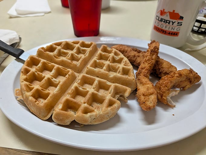The chicken and waffle combo – where breakfast and lunch stop fighting and finally make peace on your plate.
