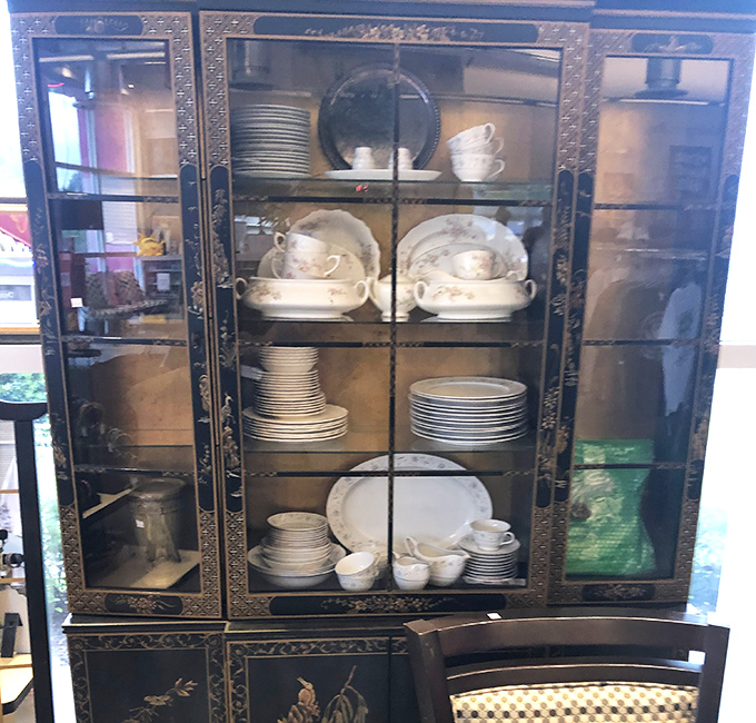This ornate china cabinet doesn't just display dishes—it showcases the elegant dining history of generations past, ready for a revival in a modern home.