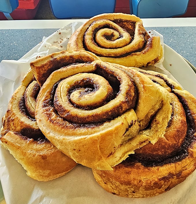 Cinnamon rolls the size of your fist—where every spiral is a journey deeper into breakfast bliss.