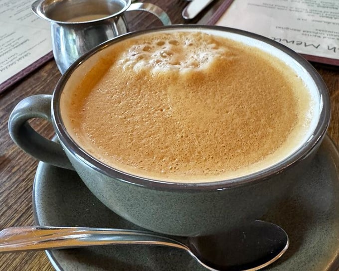 A frothy coffee that doesn't just wake you up—it gives you a reason to linger, savoring the final moments of a memorable meal.