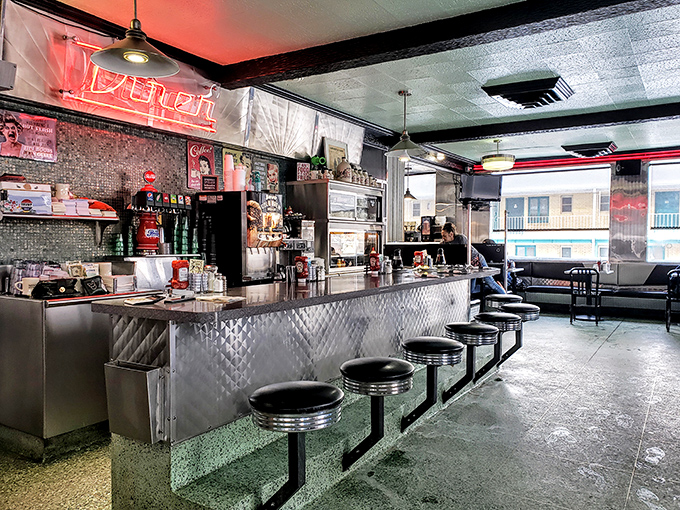 The counter where magic happens—where coffee cups are never empty and the staff remembers how you like your eggs without asking.