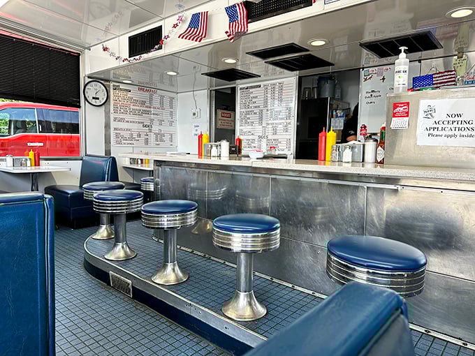 The counter view—where regulars claim their territory and newcomers become converts to the Church of the Perfect Burger and Holy Chili.