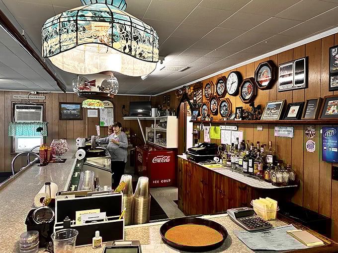 Behind this counter, seafood magic happens with the efficiency of people who've been perfecting their craft for generations.